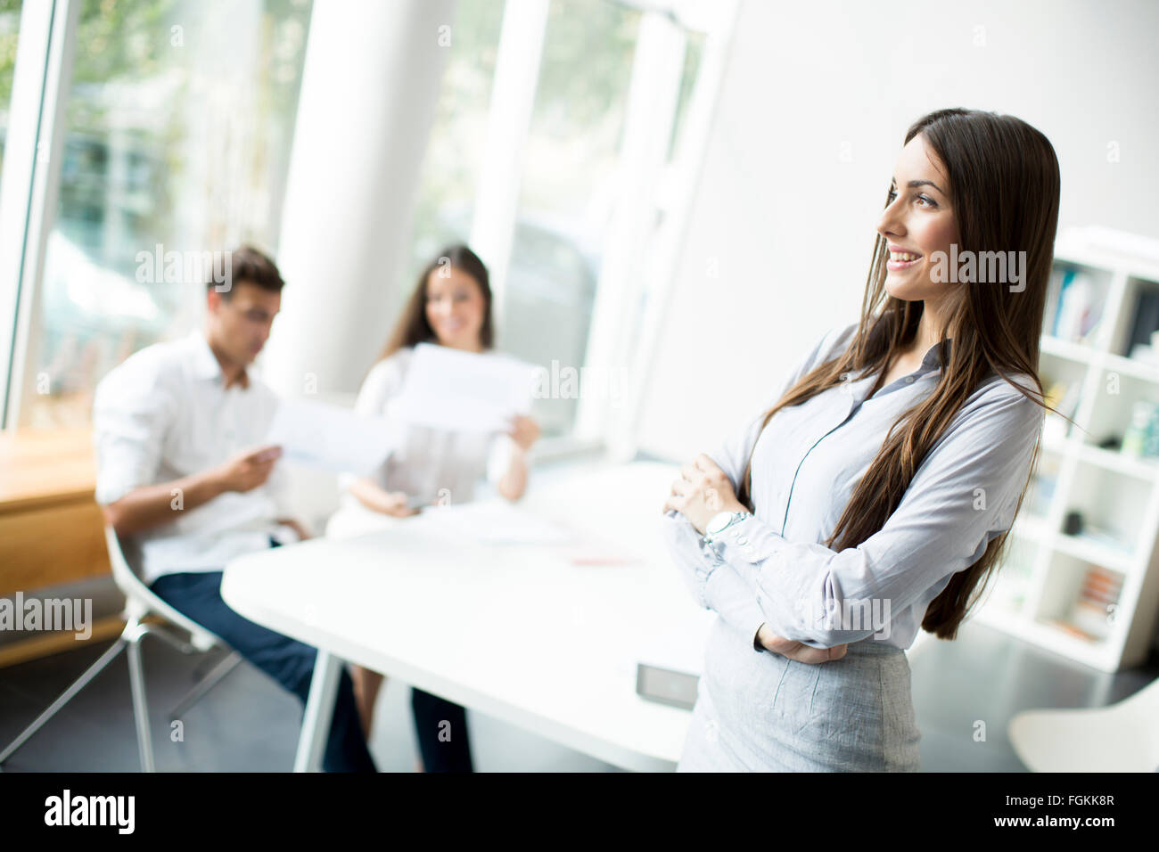 Young people in the office Stock Photo - Alamy