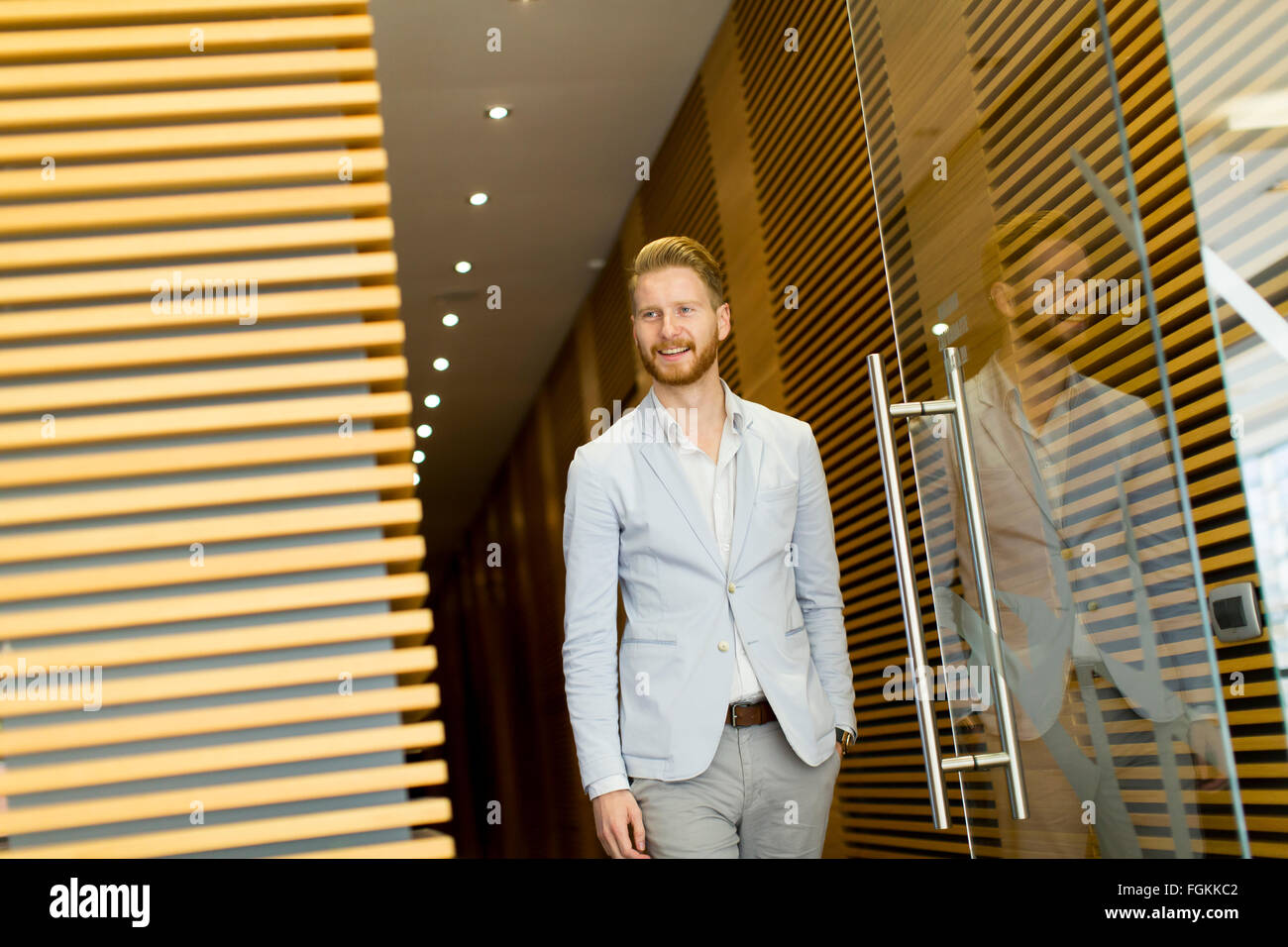 Modern young man in the office Stock Photo - Alamy
