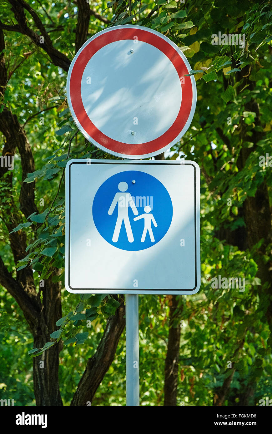 No vehicles traffic and rest zone signs in park Stock Photo - Alamy