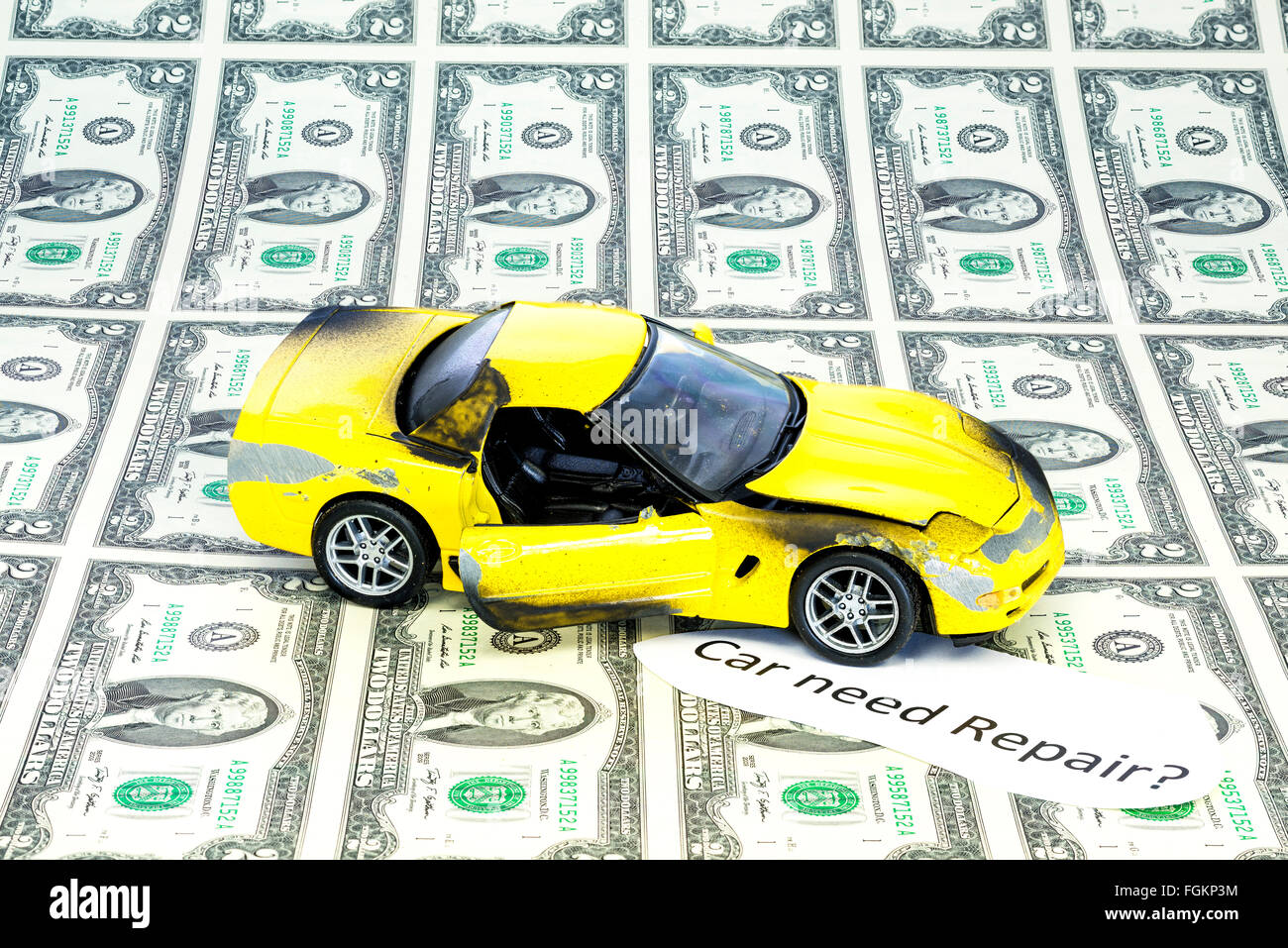 Damaged yellow car and sign need repair Stock Photo - Alamy