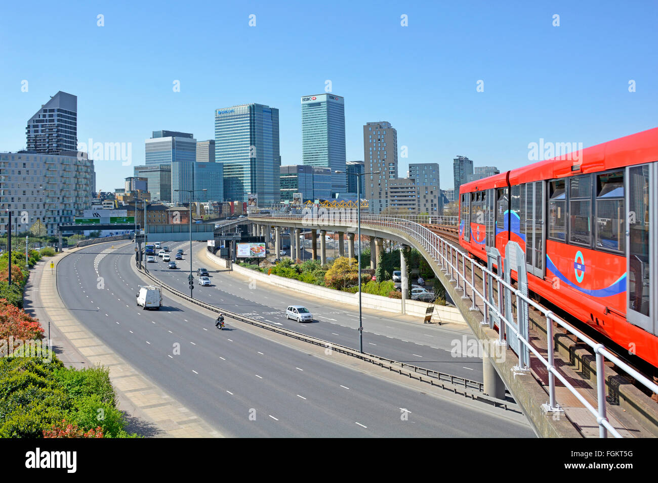 Canary Wharf skyline DLR train leaves East India station in London ...