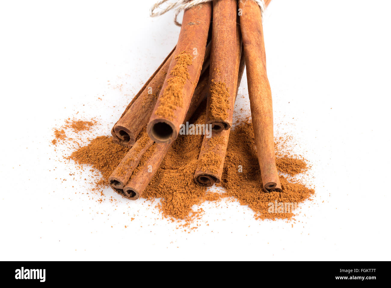 cinnamon sticks with powder isolated on white background Stock Photo ...