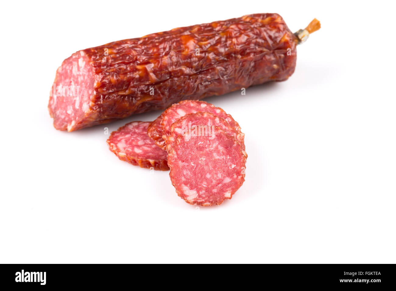 sliced salami isolated on a white background Stock Photo - Alamy