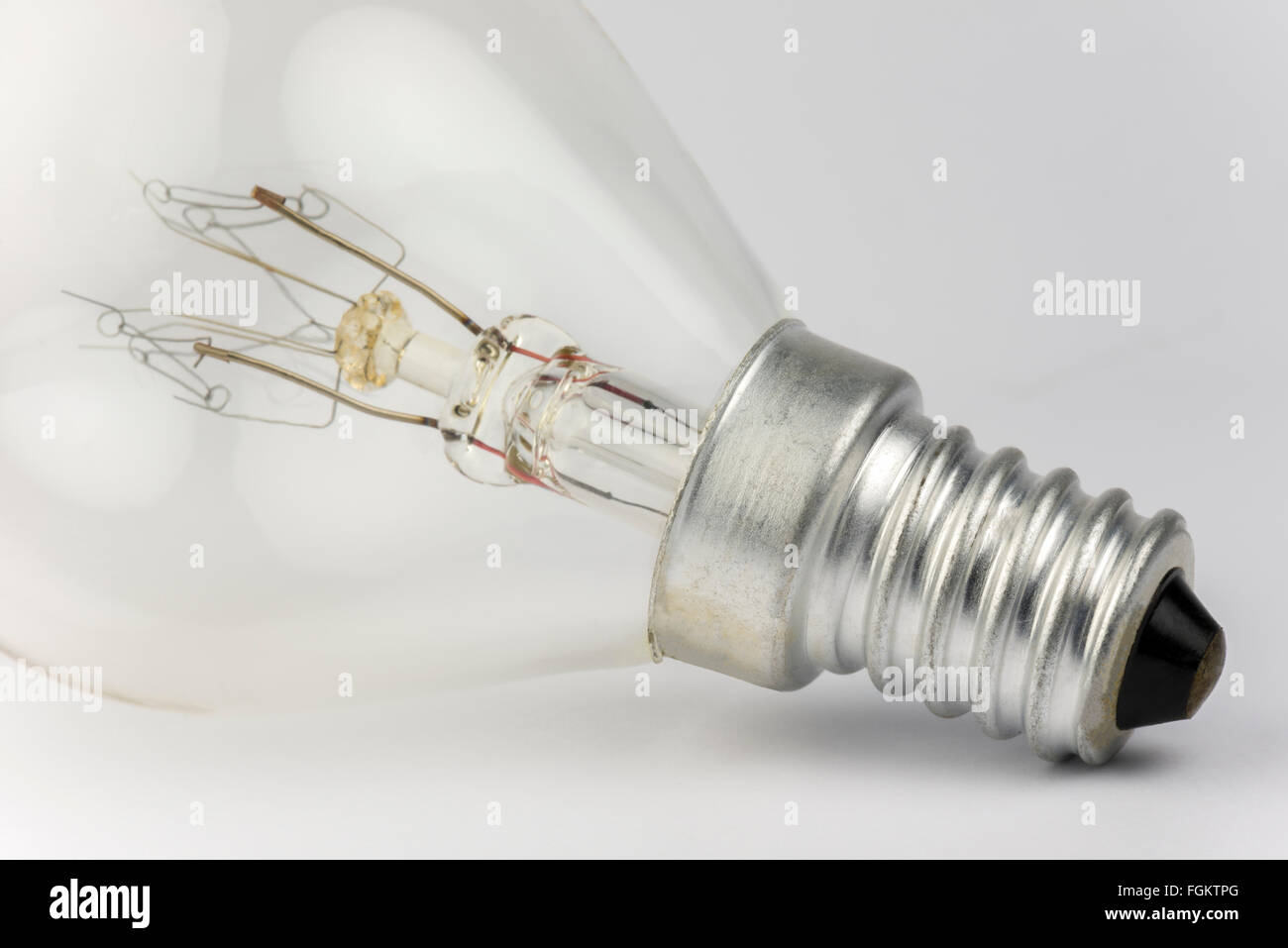 Old light bulb with artfully shaped filaments Stock Photo - Alamy