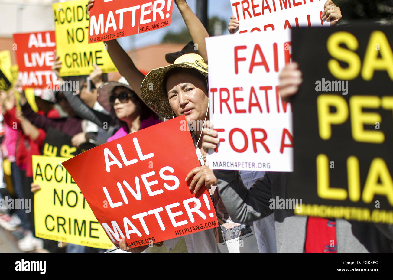 Los Angeles, California, USA. 20th Feb, 2016. Protesters carry signs ...