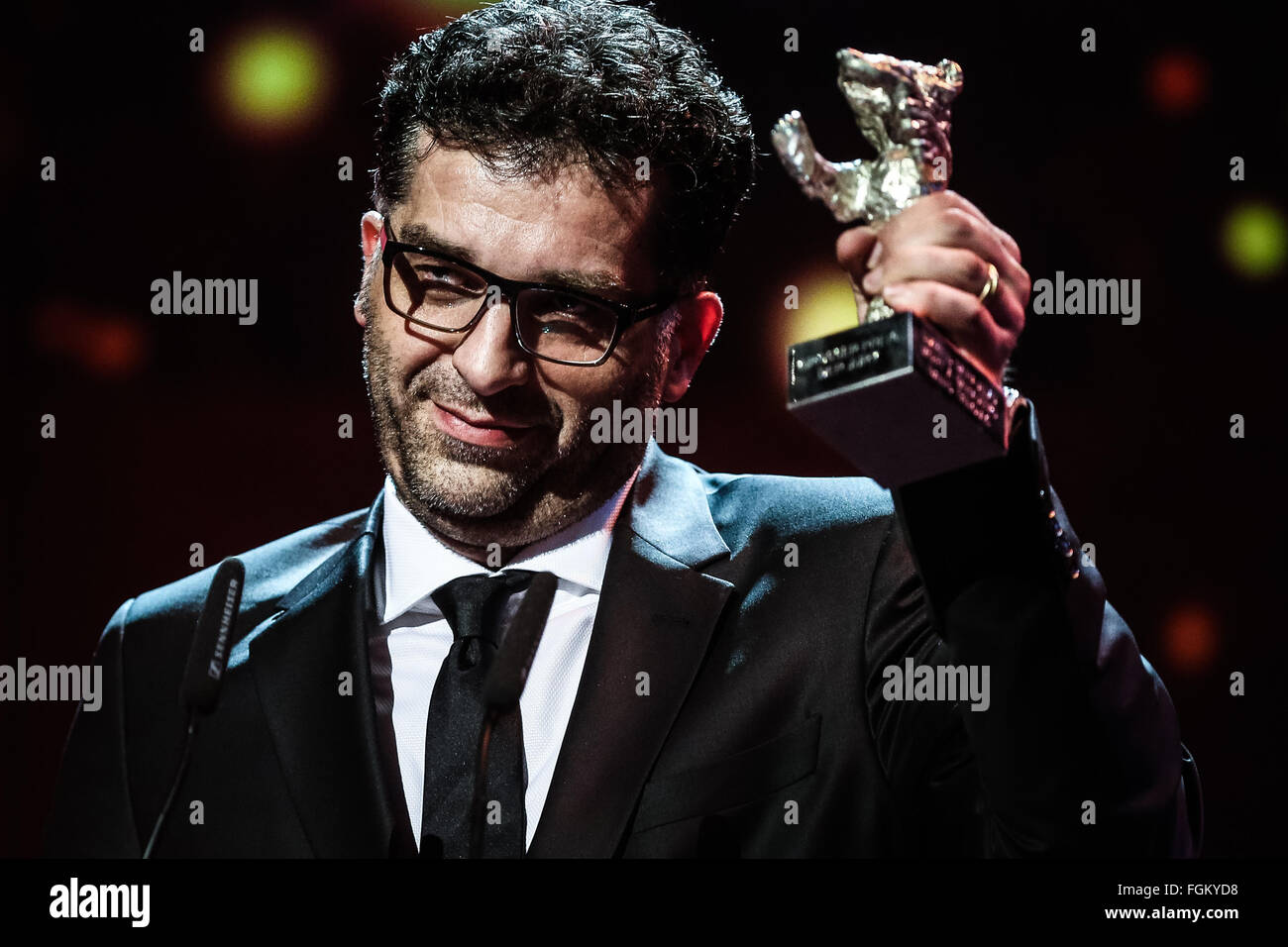 Berlin, Germany. 20th Feb, 2016. Bosnian director Danis Tanovic holds ...