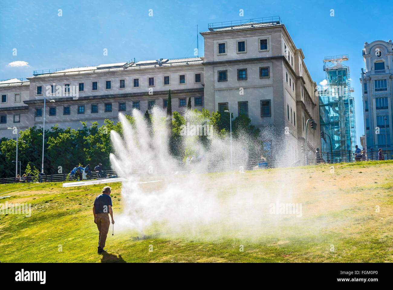 View of water on the grass in Atocha area, Madrid city, Spain Stock ...