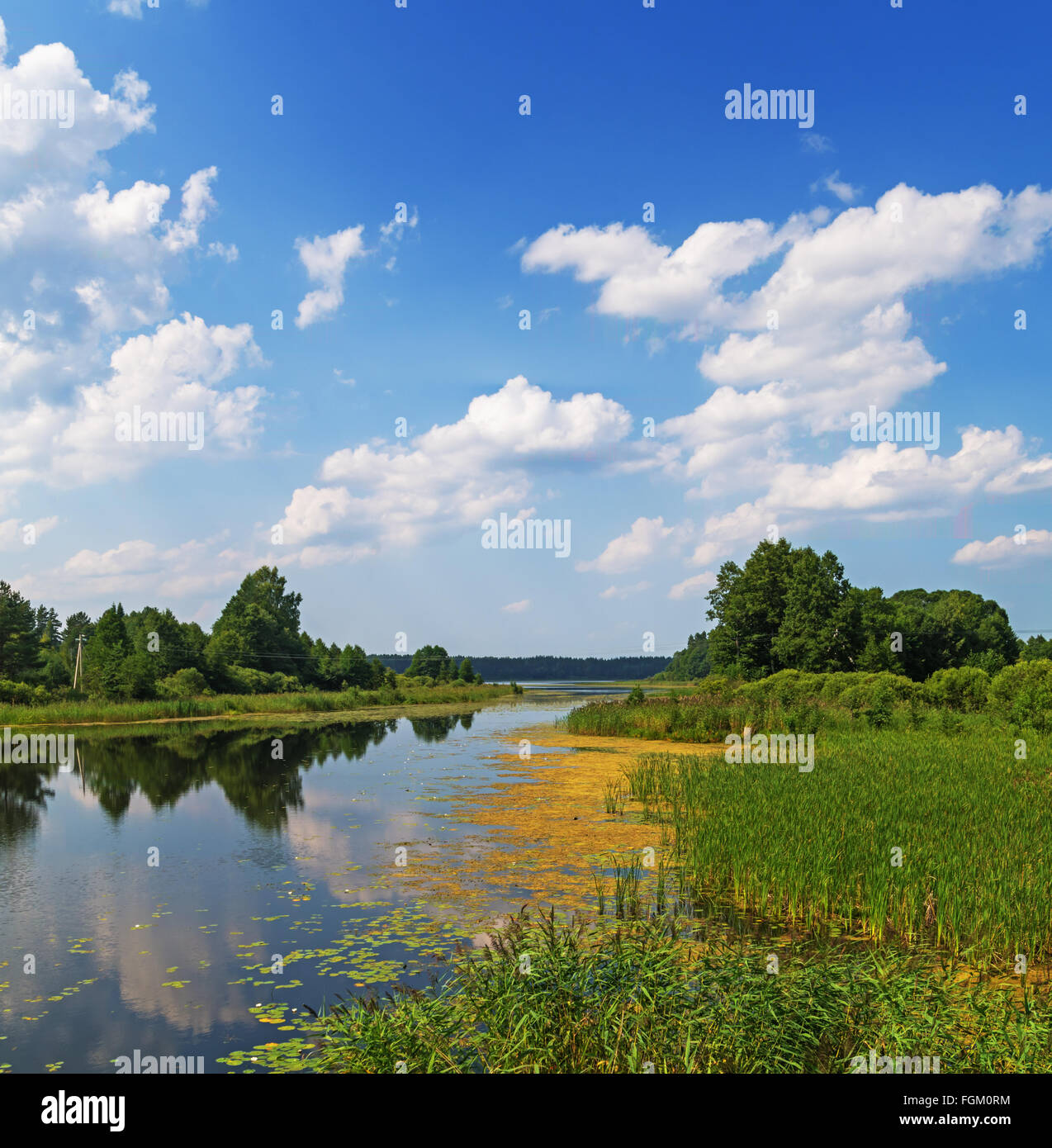 Clouds over river and lake in the distance Stock Photo - Alamy