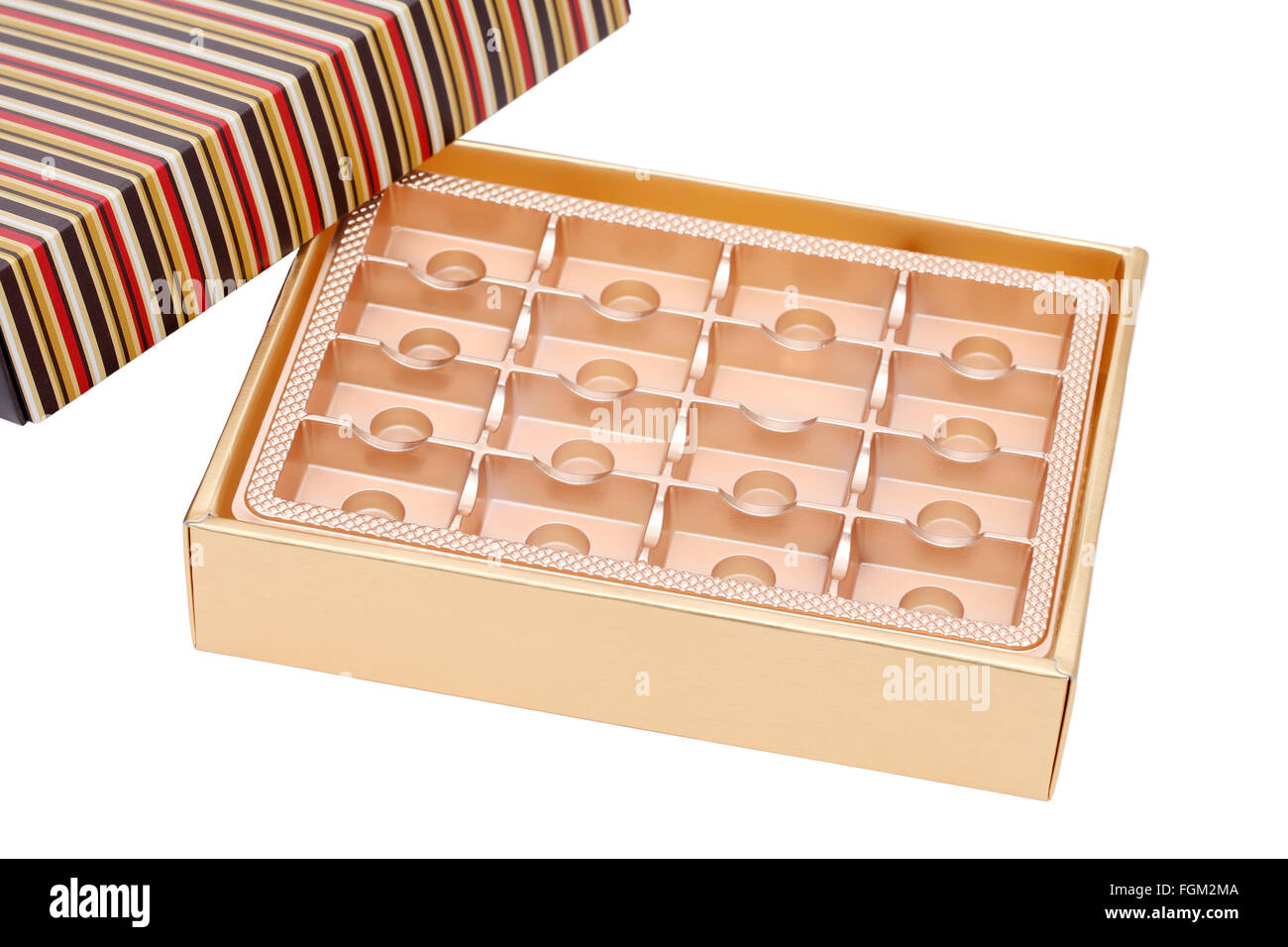 Empty box from sweets of gold color on white background Stock Photo - Alamy