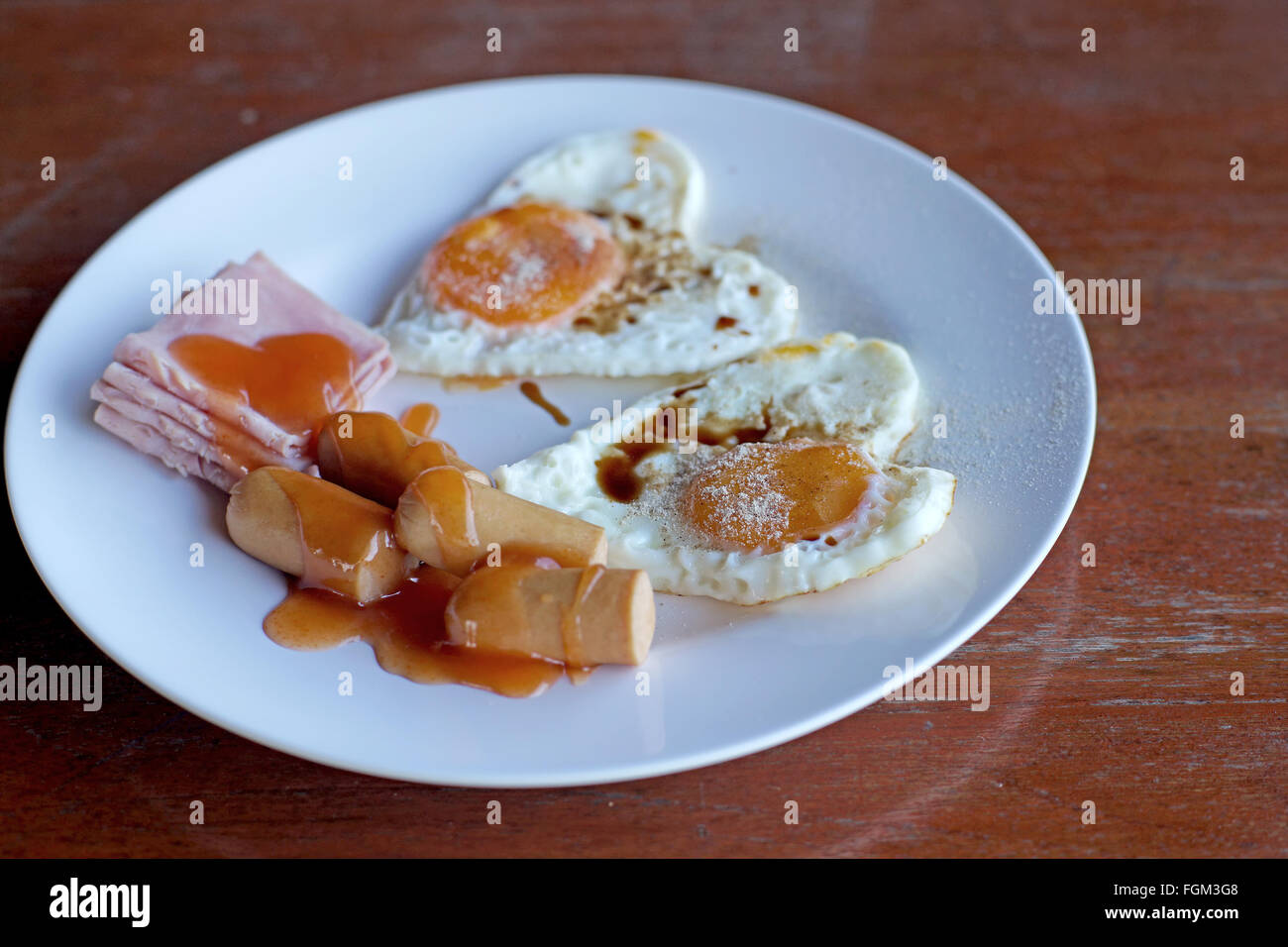breakfast meal with sausage ham and egg Stock Photo - Alamy