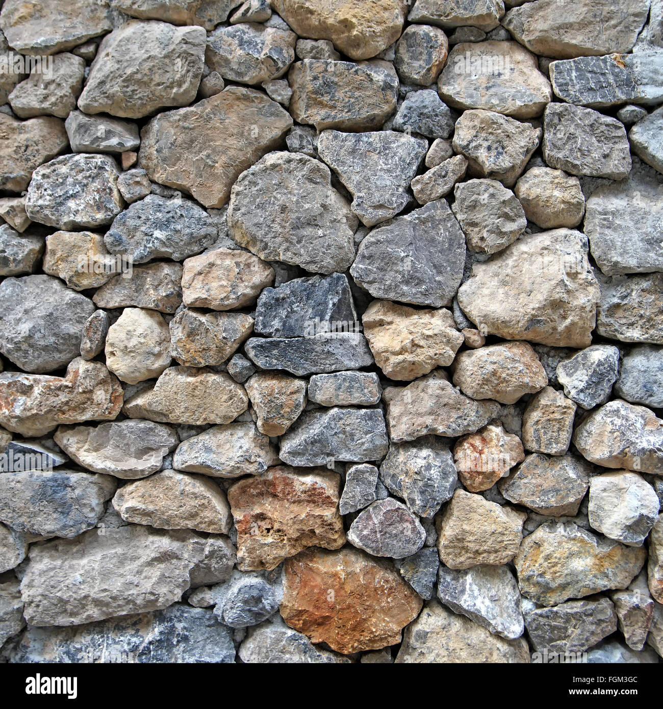 Stone wall as background or texture Stock Photo - Alamy