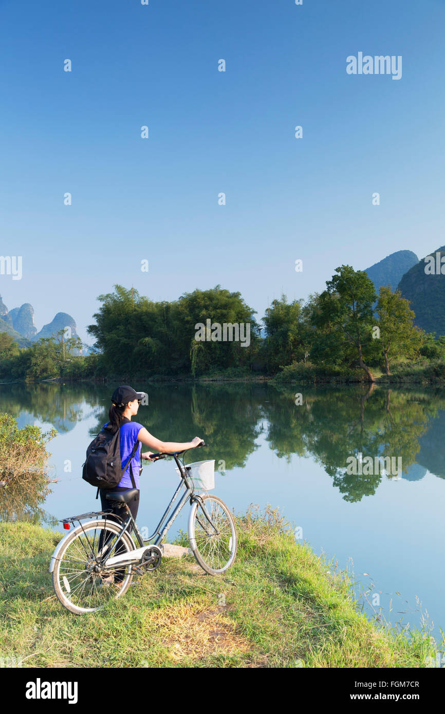 Chinese woman cyclist hi-res stock photography and images - Alamy