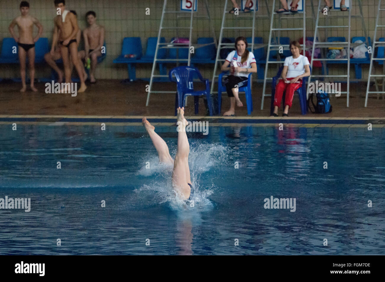 RUSSIA, MOSCOW - APRIL 29 2015: Unidentified athletes dive into the ...