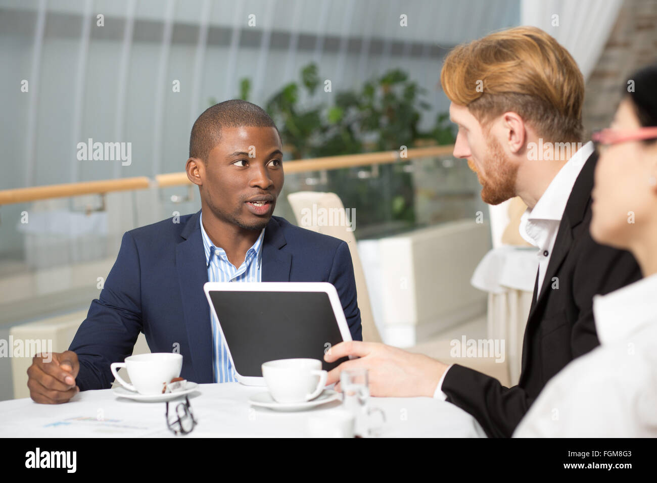 Business meeting in restaurant Stock Photo - Alamy