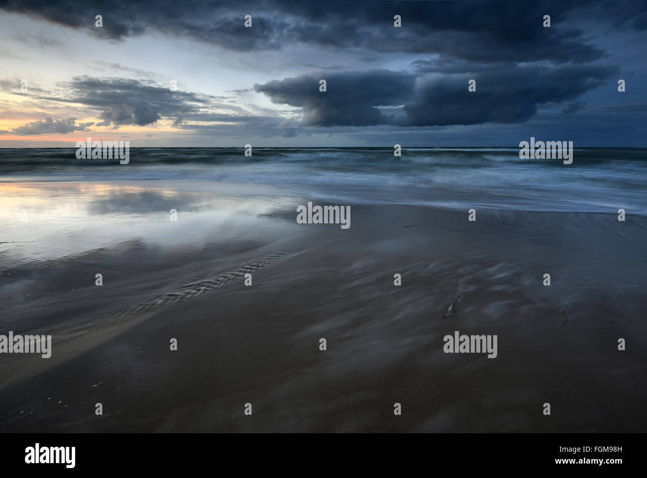 Wet sand reflection hi-res stock photography and images - Alamy