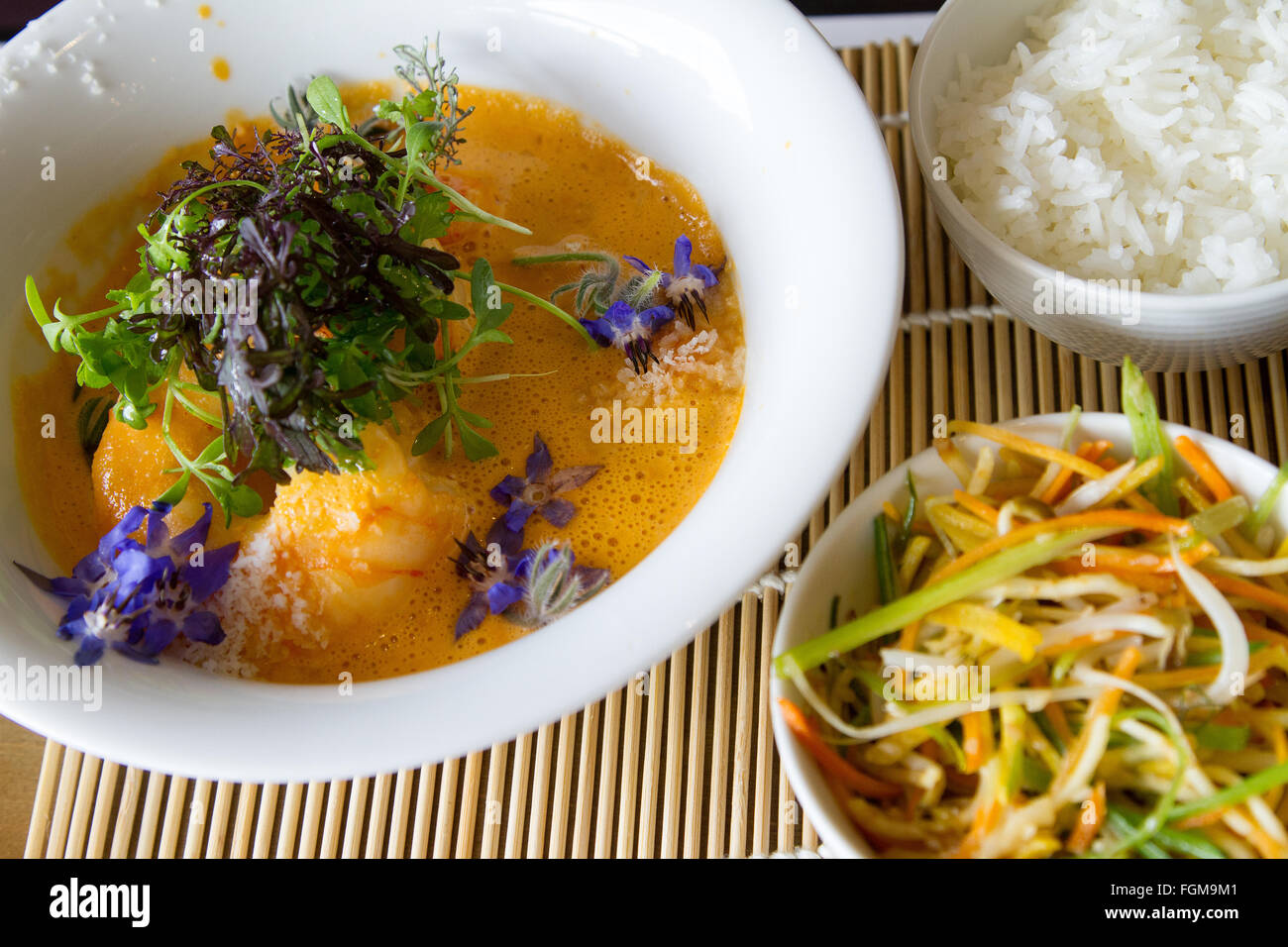 Fish curry with rice and vegetables Stock Photo - Alamy
