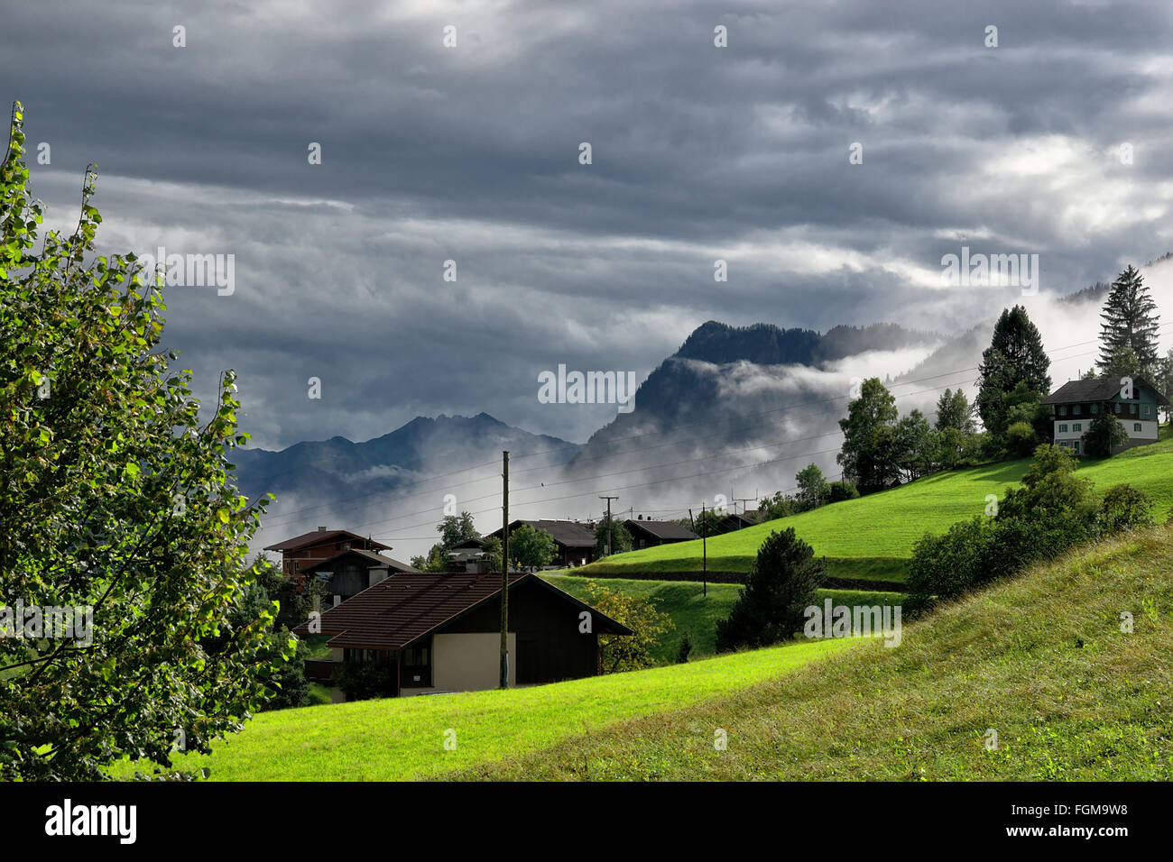 Village in the fog hi-res stock photography and images - Alamy