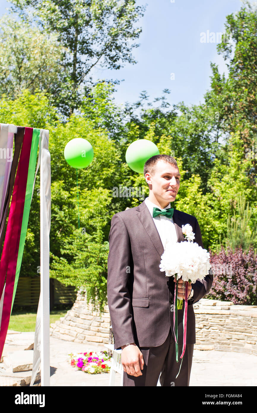 young man waiting woman.Groom waiting bride.Just married. Close up ...