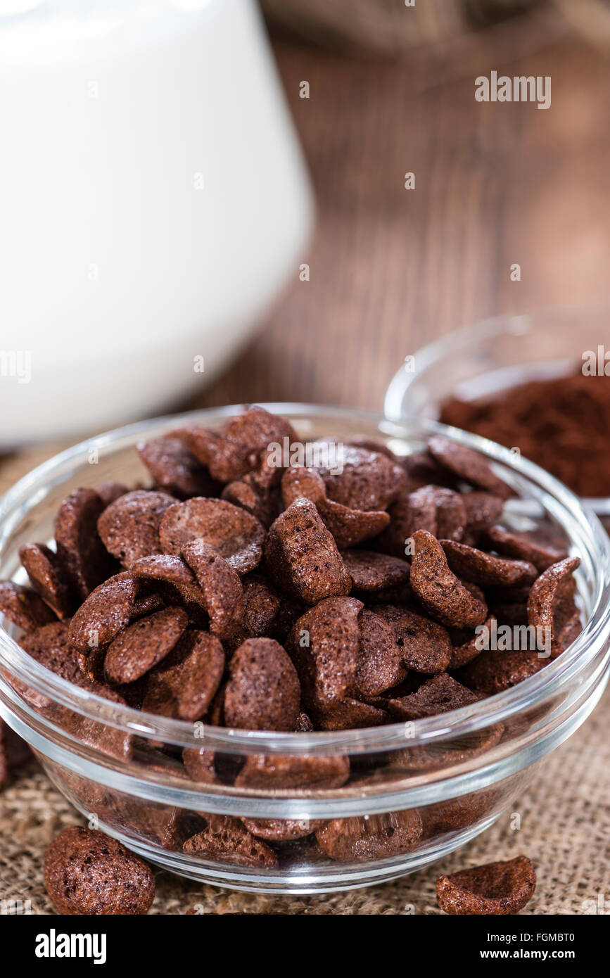 Portion of sweet breakfast (choco flakes) on wooden background Stock ...