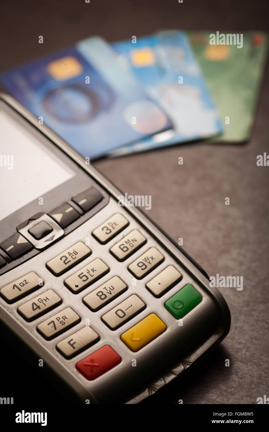 Color image of a POS and credit cards Stock Photo - Alamy