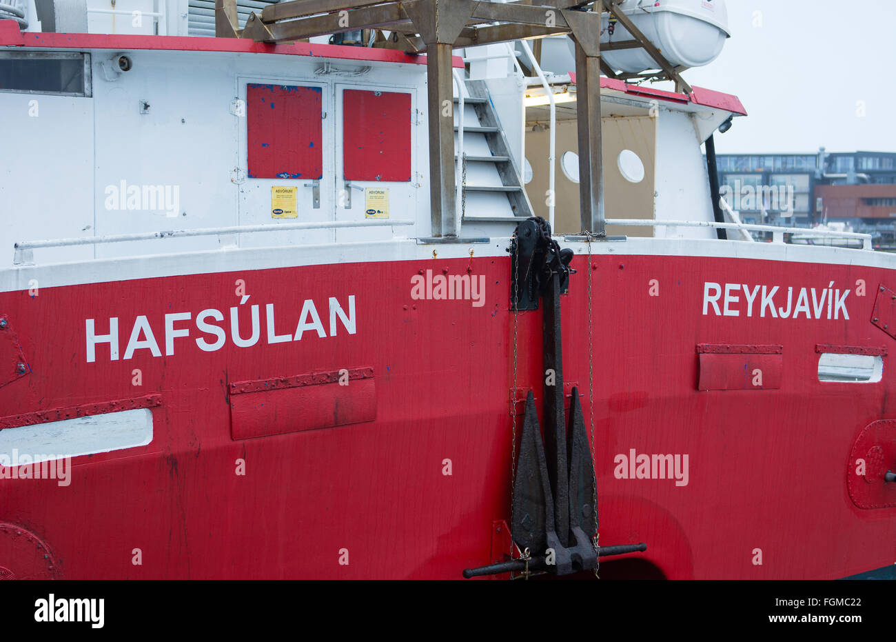Reykjavik Iceland red fishing boat in harbor of marina closeup ...