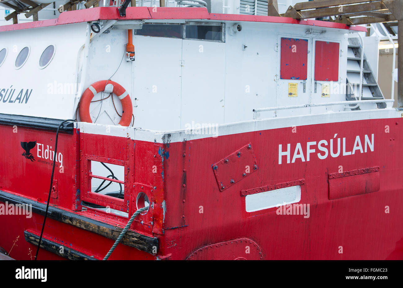 Reykjavik Iceland red fishing boat in harbor of marina closeup ...