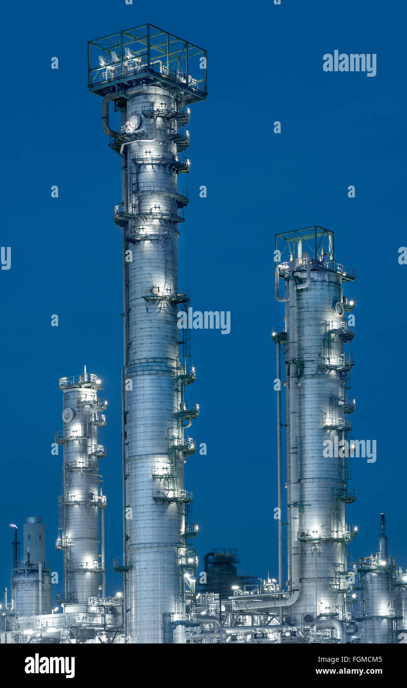 Oil refinery towers at dusk. Europoort, Rotterdam, The Netherlands ...