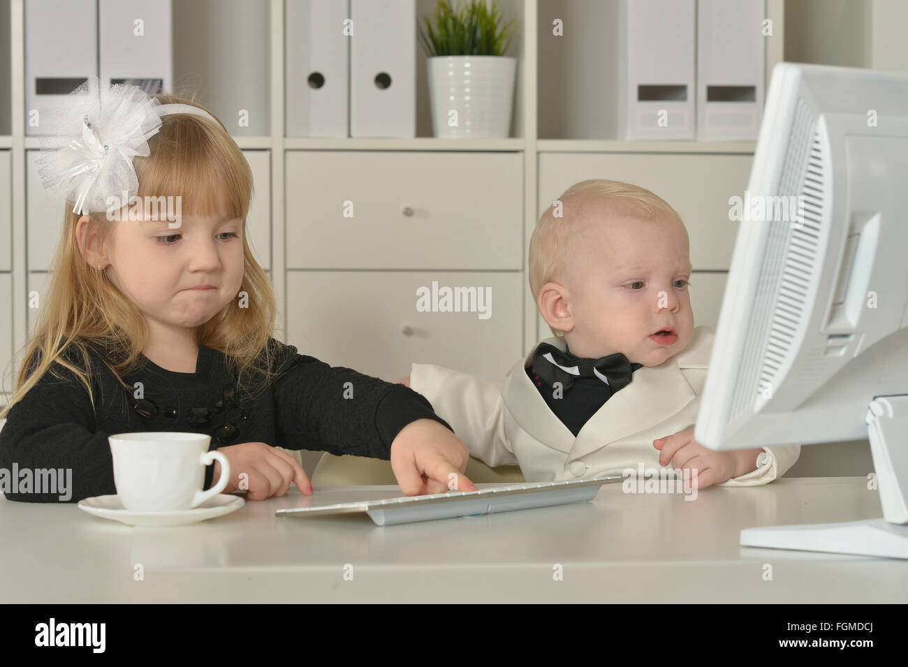 Blond boy computer hi-res stock photography and images - Alamy