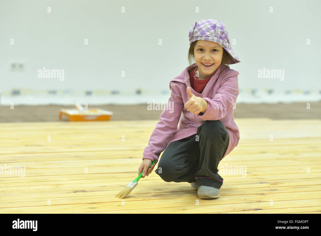 little girl doing repair at home Stock Photo - Alamy