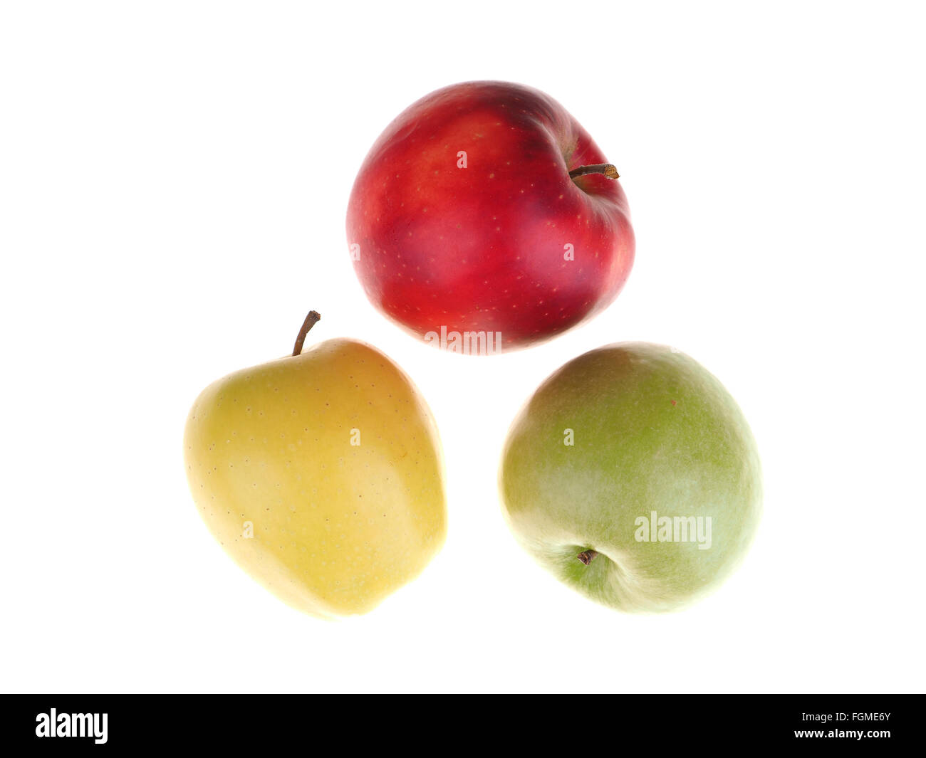 red, green and yellow apples on a white background Stock Photo - Alamy