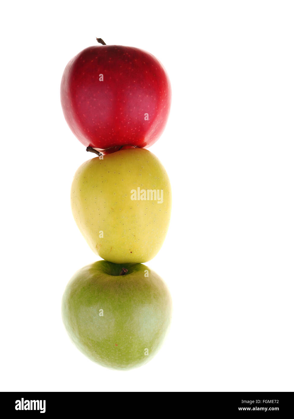red, green and yellow apples on a white background Stock Photo - Alamy
