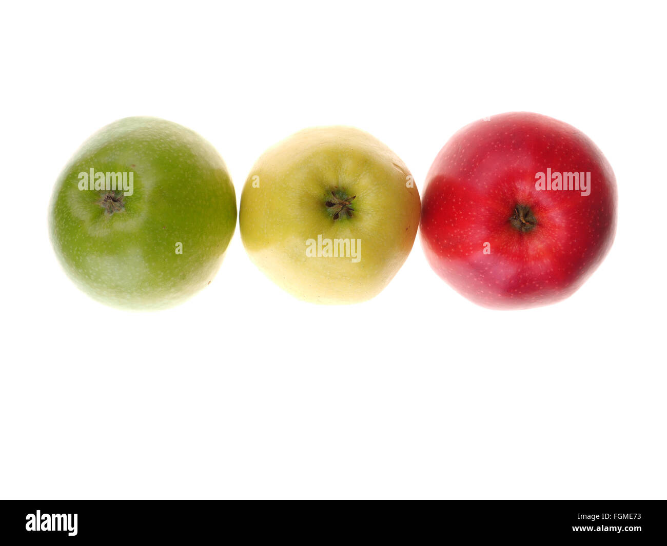 red, green and yellow apples on a white background Stock Photo - Alamy