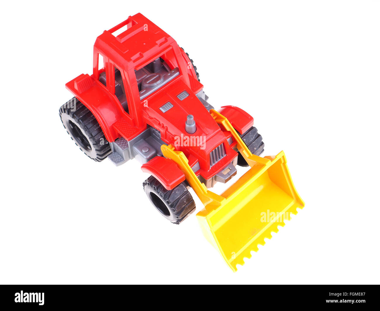 red toy tractor on a white background Stock Photo - Alamy