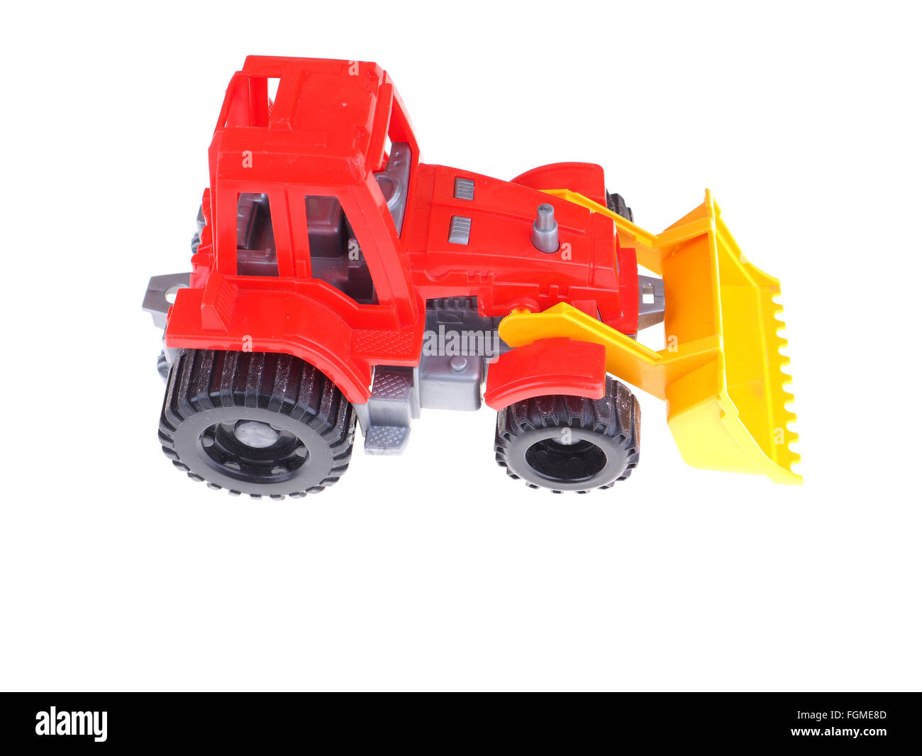 red toy tractor on a white background Stock Photo - Alamy