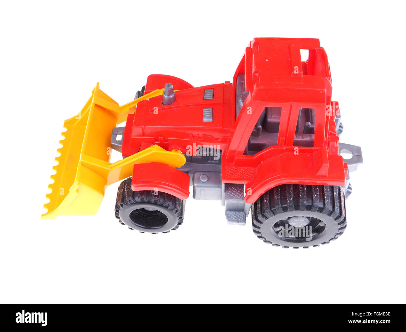 red toy tractor on a white background Stock Photo - Alamy