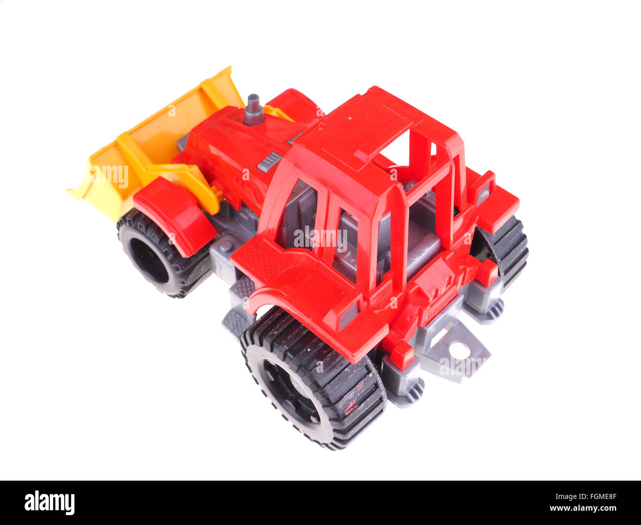red toy tractor on a white background Stock Photo - Alamy