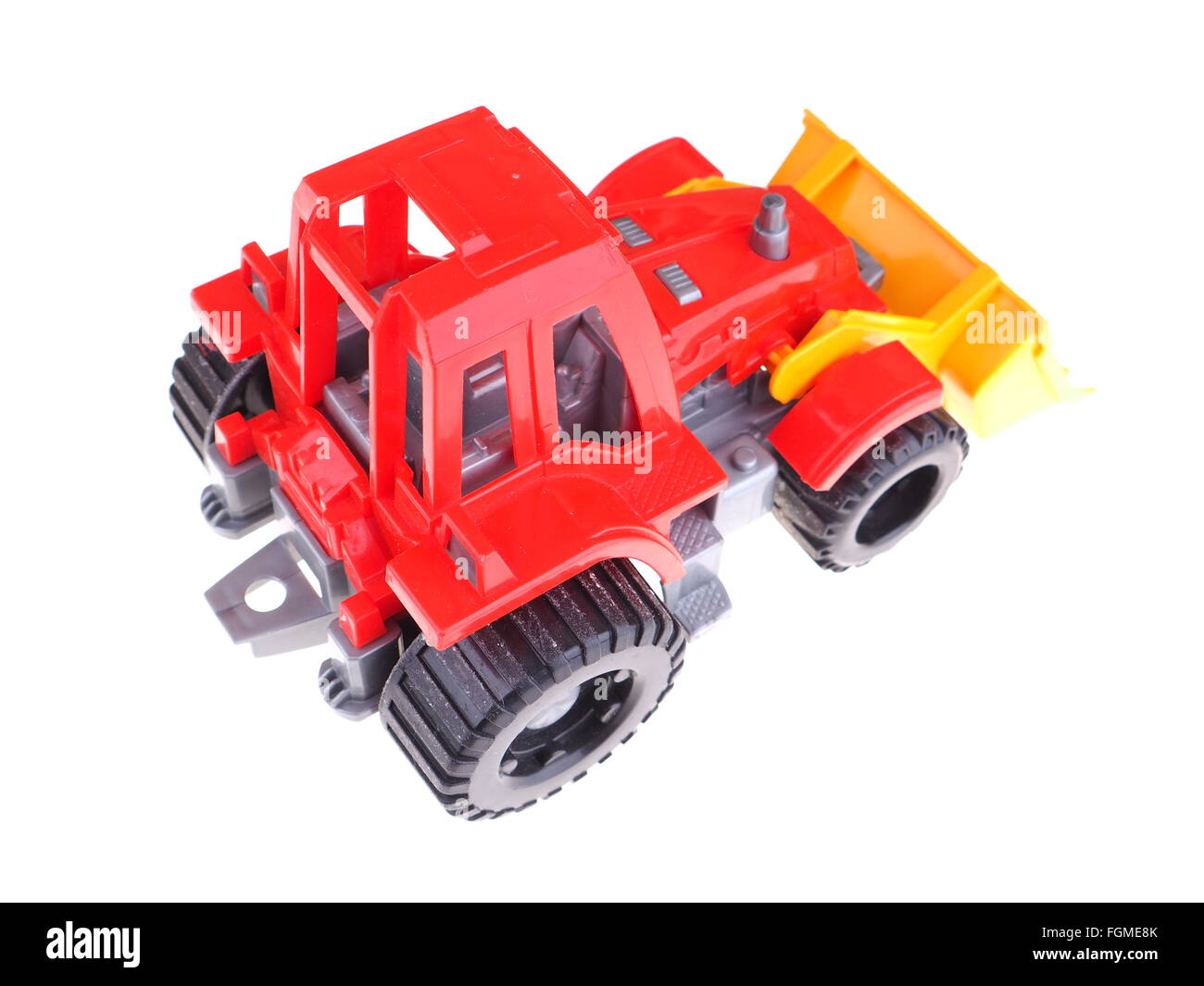 red toy tractor on a white background Stock Photo - Alamy