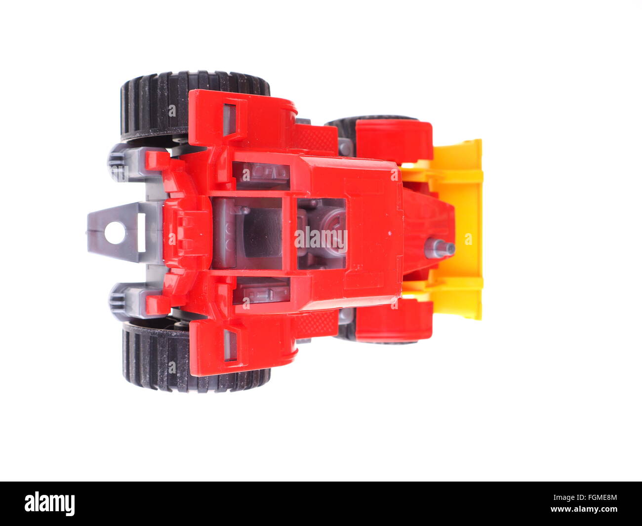 red toy tractor on a white background Stock Photo - Alamy