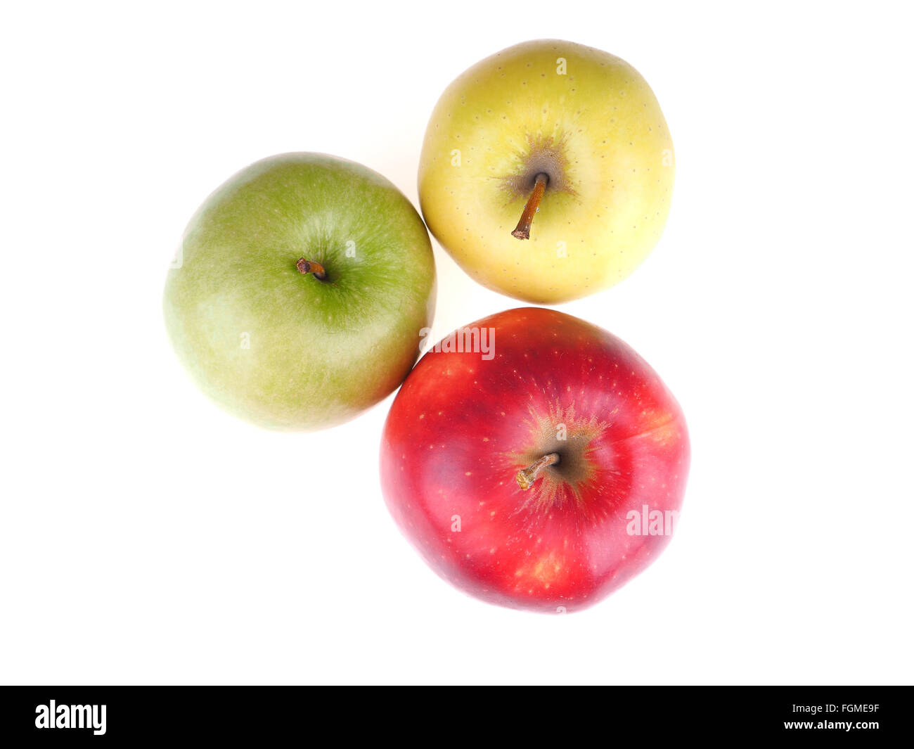 red, green and yellow apples on a white background Stock Photo - Alamy