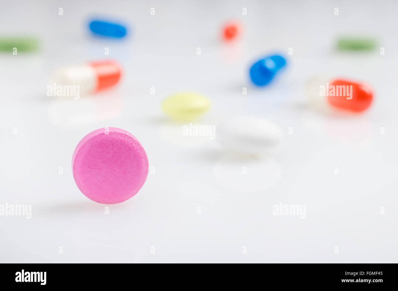 Colored medicine tablets Stock Photo - Alamy