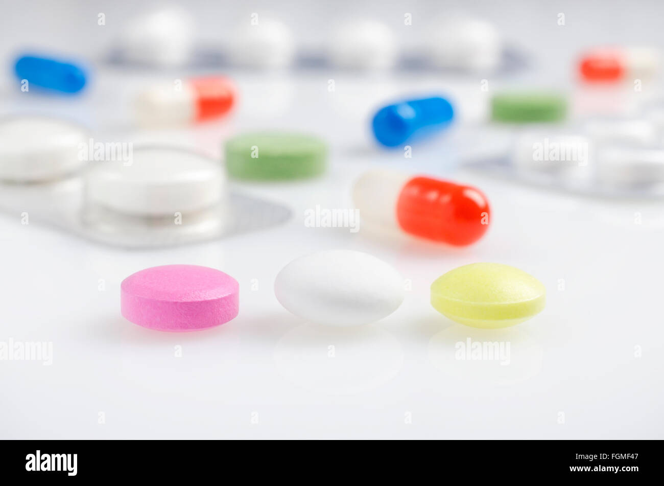 Colored medicine tablets Stock Photo - Alamy
