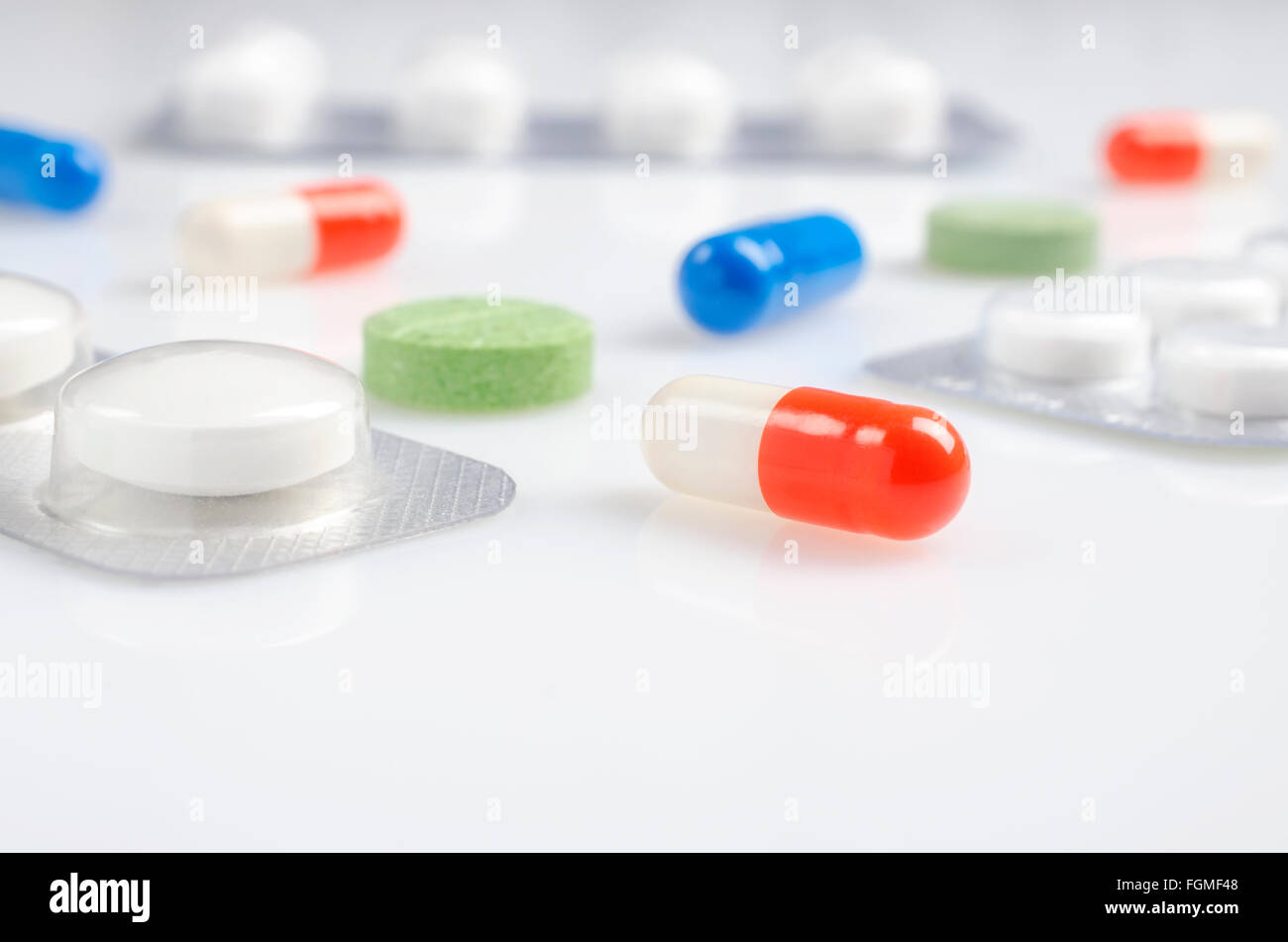 Colored medicine tablets Stock Photo - Alamy