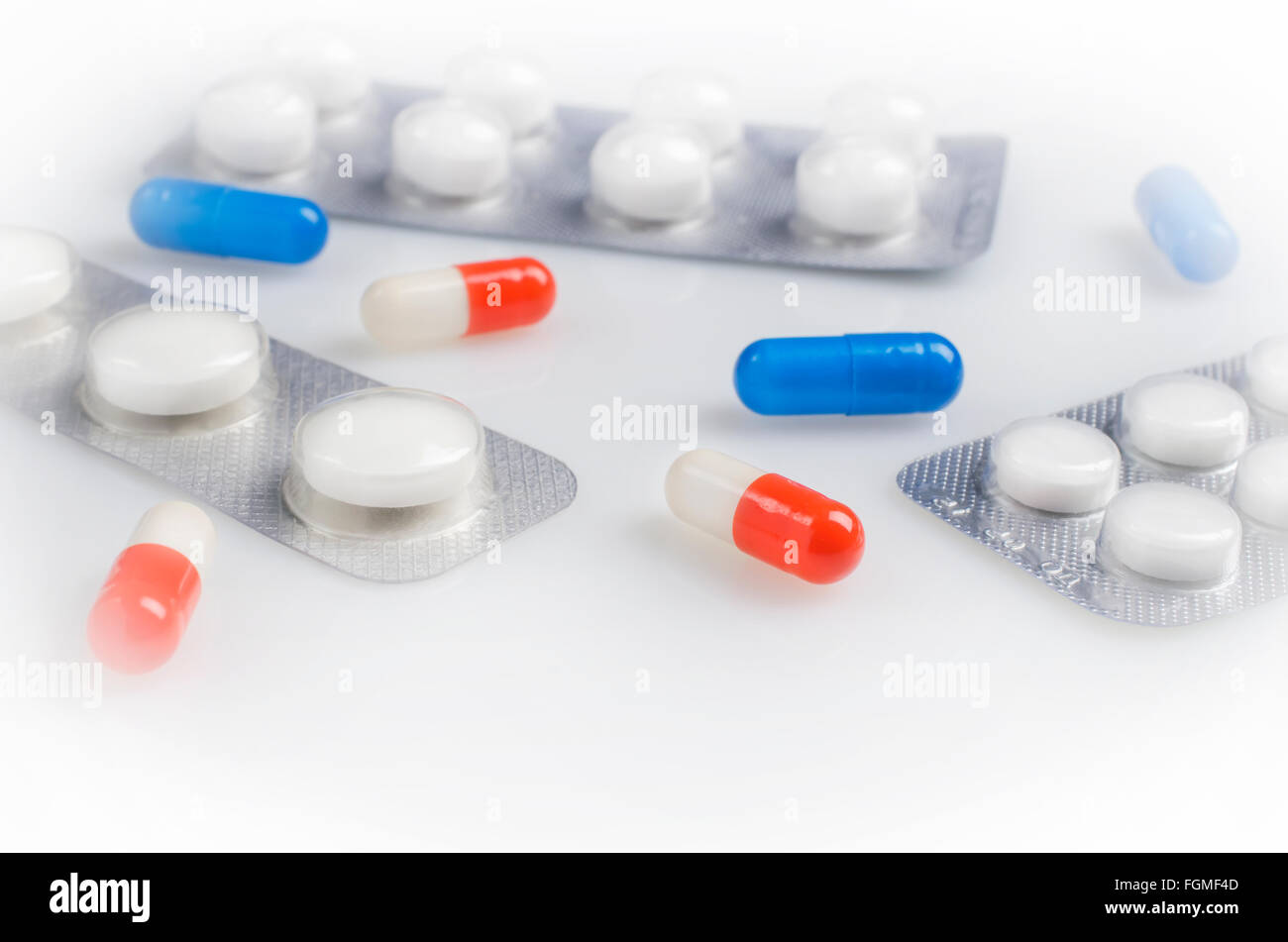 Colored medicine tablets Stock Photo - Alamy