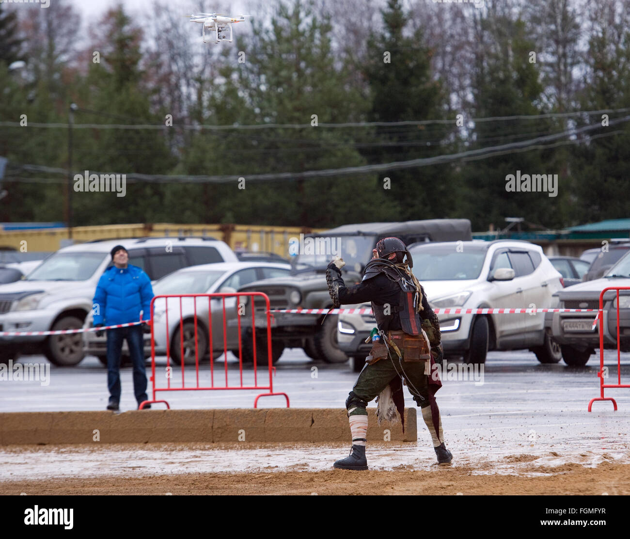 KUBINKA - NOVEMBER 21, 2015: Unidentified weird man fight with a drone ...