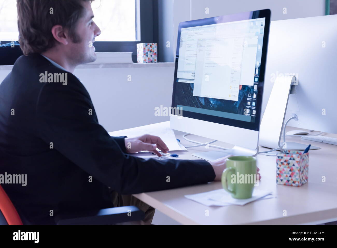 startup business, software developer working on computer at modern ...