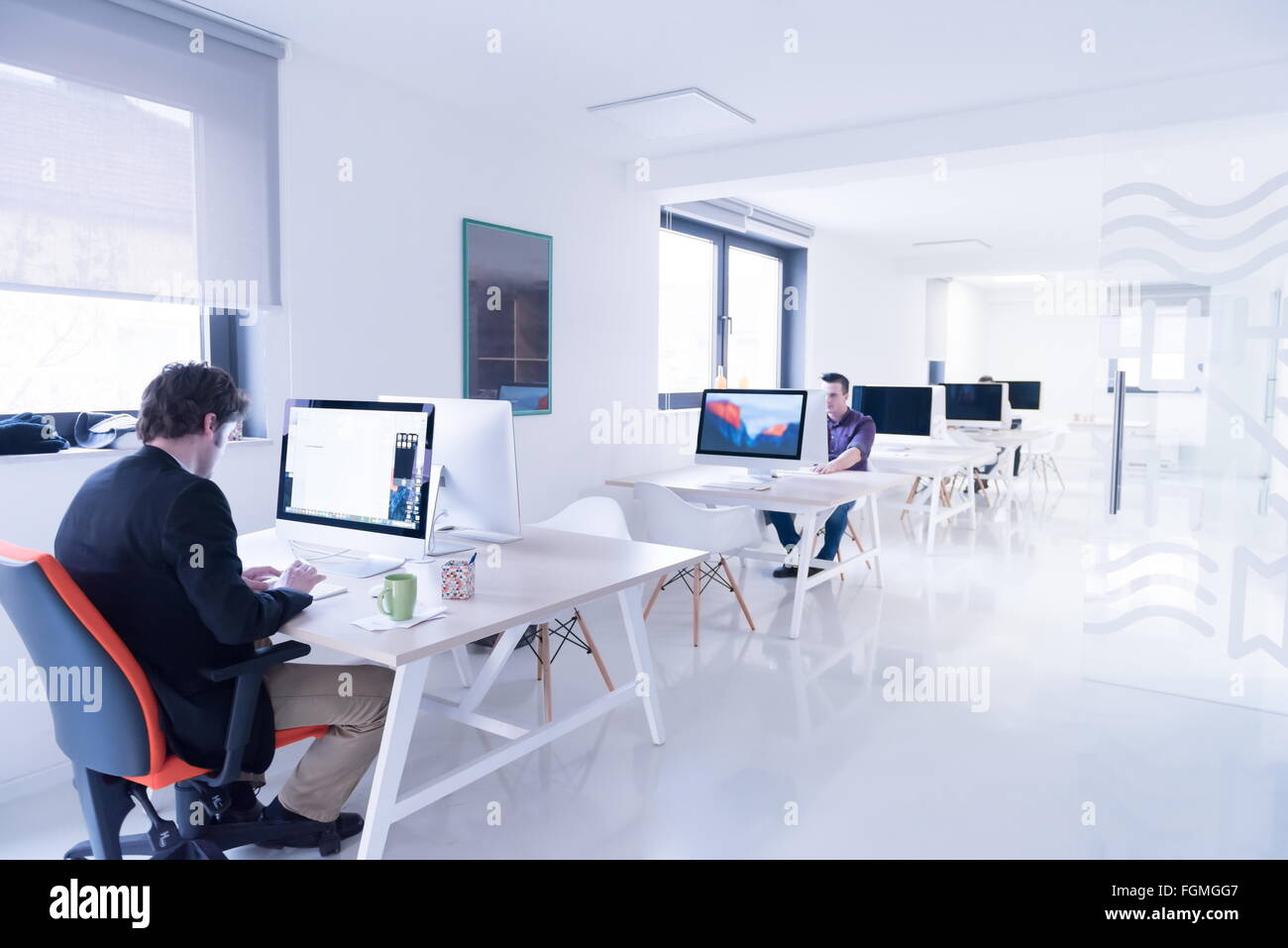 startup business, software developer working on computer at modern ...