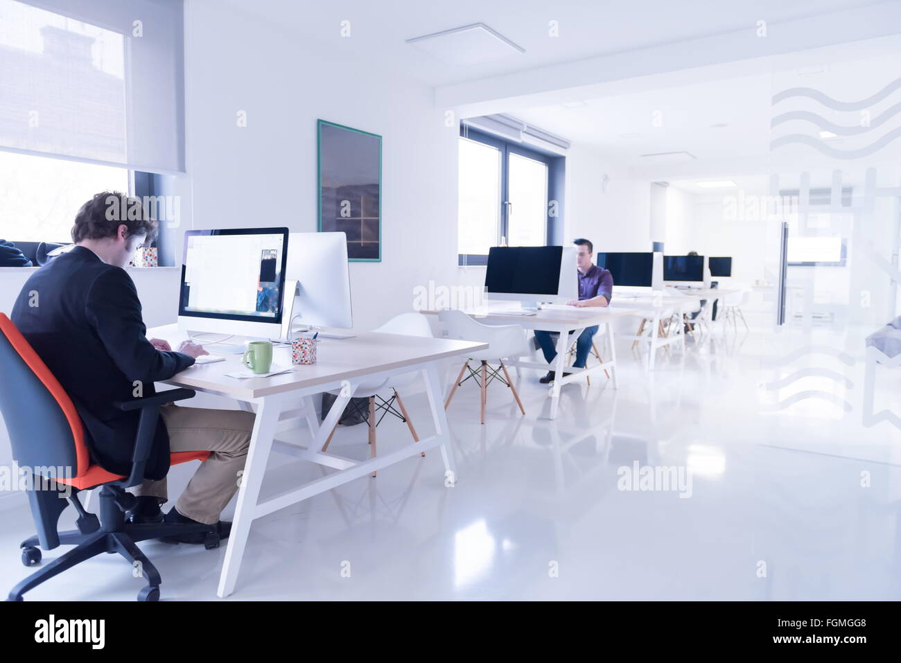 startup business, software developer working on computer at modern ...