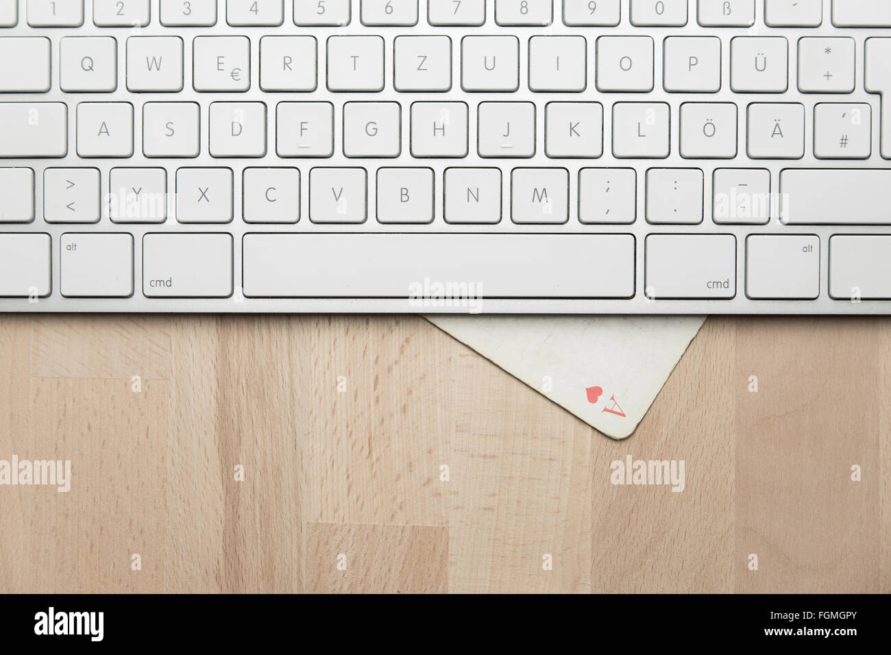 ace under a keyboard Stock Photo - Alamy