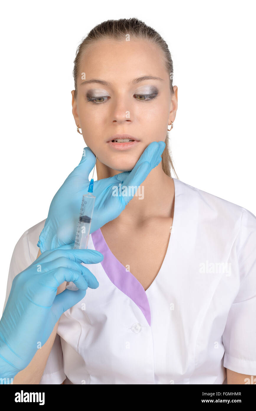 Young beautiful girl getting Botox injection from a syringe Stock Photo ...