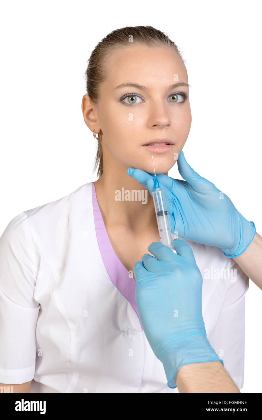 Young beautiful girl getting Botox injection from a syringe Stock Photo ...